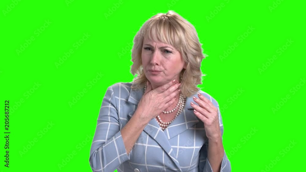 Sick mature woman on green screen. Middle-aged female person suffering ...