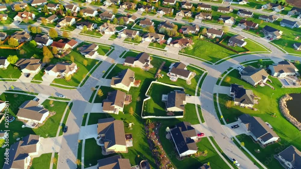 Beautiful neighborhoods, homes, Springtime aerial view at sunrise ...