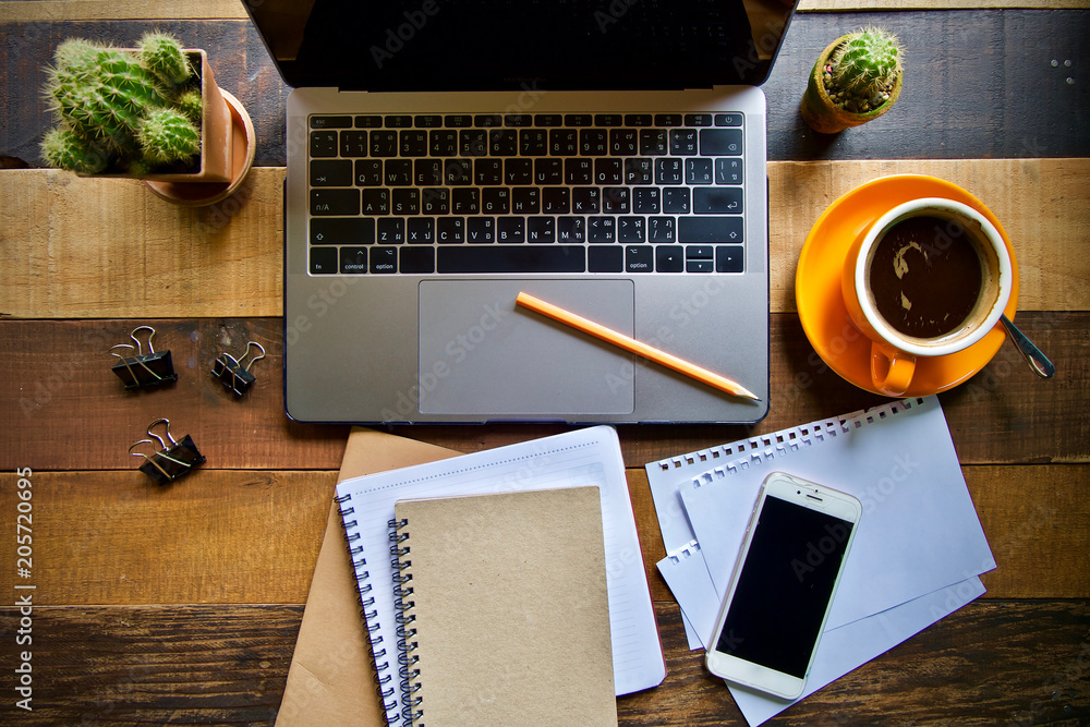 Desk work coffee cup and laptop notebook pen on wooden table Stock ...