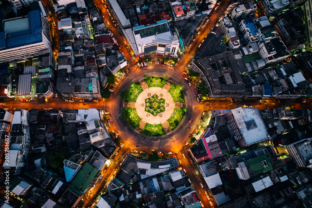 Aerial view of roundabout or circle of road with light trails on the ...