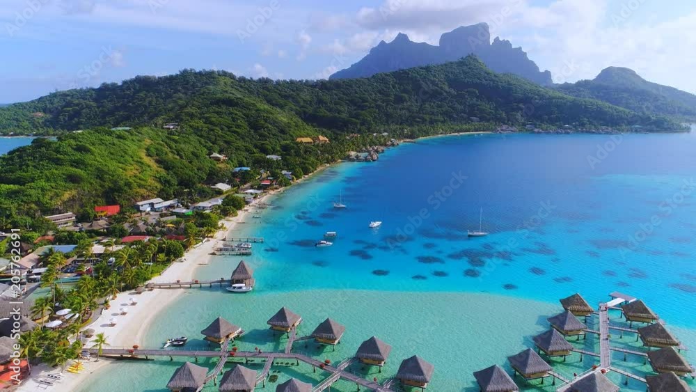 Aerial view of tropical paradise of Bora Bora island, turquoise crystal ...