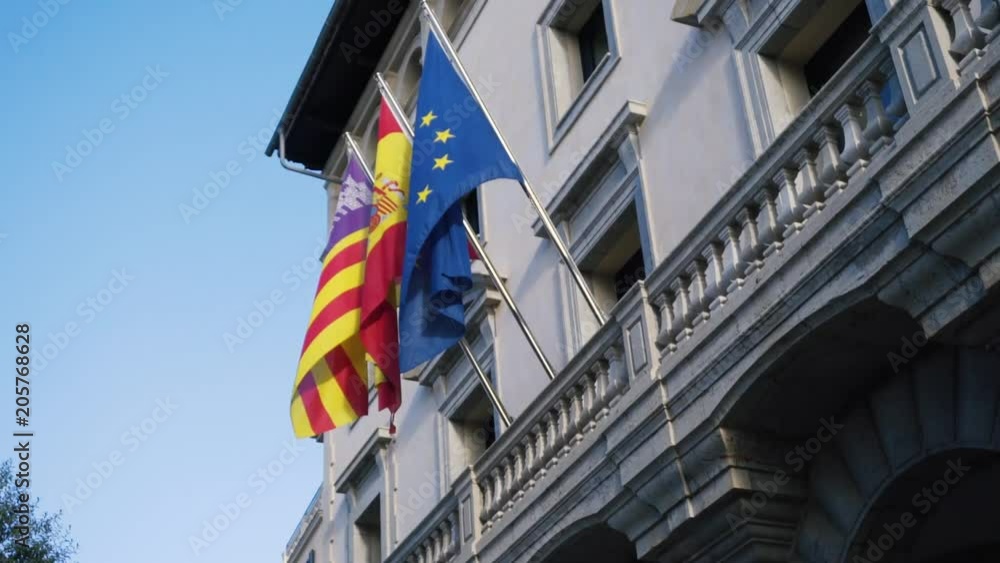 Colorful flags from different countries on building background. Stock ...