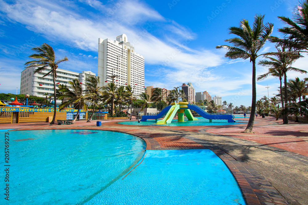 Public pools on the red paved promenade of Durban's "Golden Mile ...