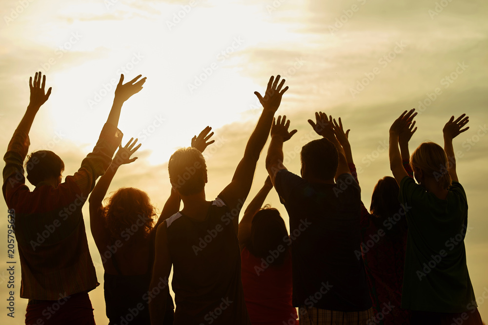 People putting hands up. Evening silhouette of kids raising hands up ...