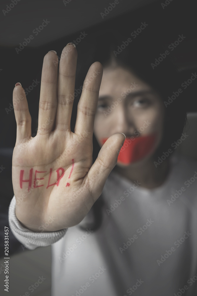 Kidnapped girl showing help word on her palm Stock Photo | Adobe Stock