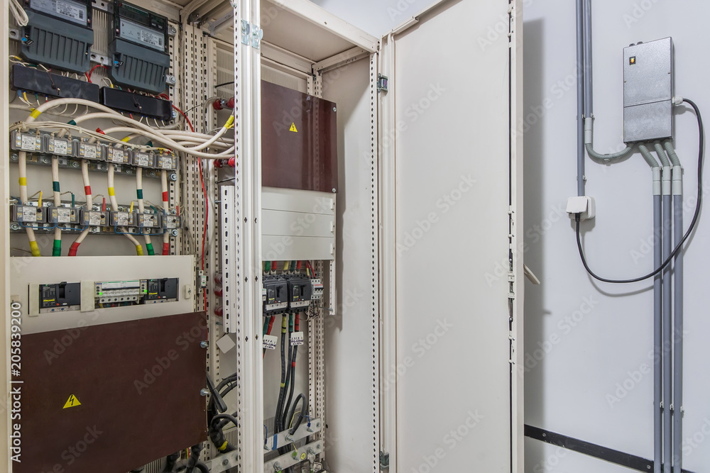 Electrical control cabinet with an open door Stock Photo | Adobe Stock