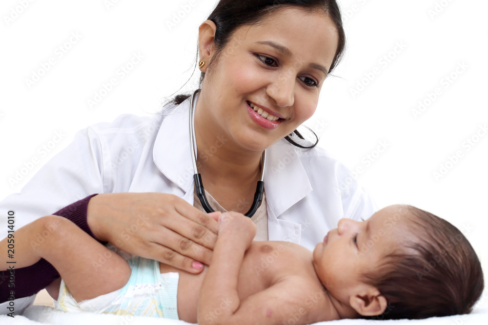 Newborn baby examination by doctor woman Stock Photo | Adobe Stock