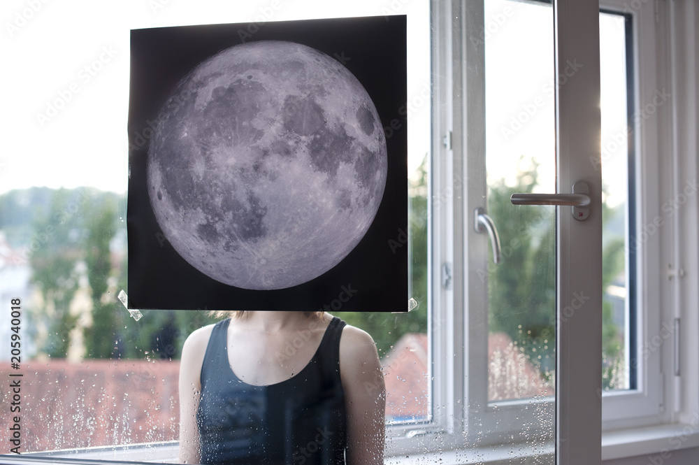 Mondgesicht im Fenster Stock Photo | Adobe Stock