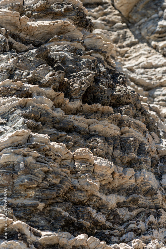 Foto Stock Compressed rock layers formation in various colors and ...