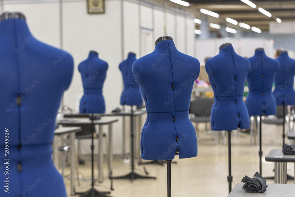 nterior of garment factory shop. Closes making atelier with several ...