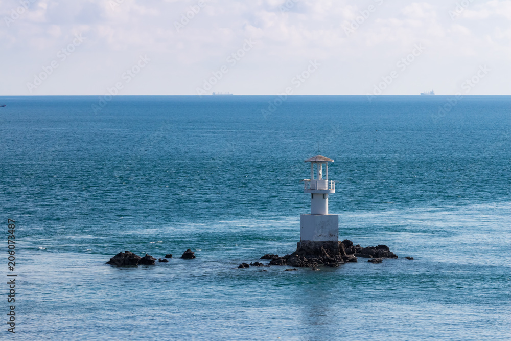 Lighthouse in the sea,lights from lighthouse use to tell the direction ...