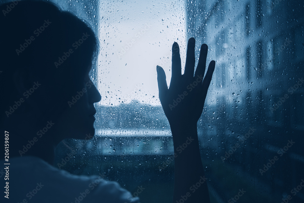 sad lonely depression mood woman silhouette touch glass windows rainy ...