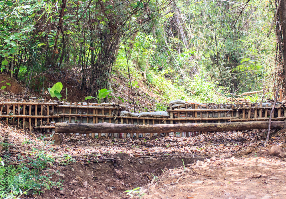 check dam made by local materials; wood, soil, stone etc. in Thailand ...