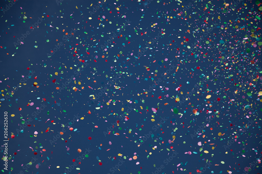 confetti falling during a festival or carnival in the city Stock Photo ...