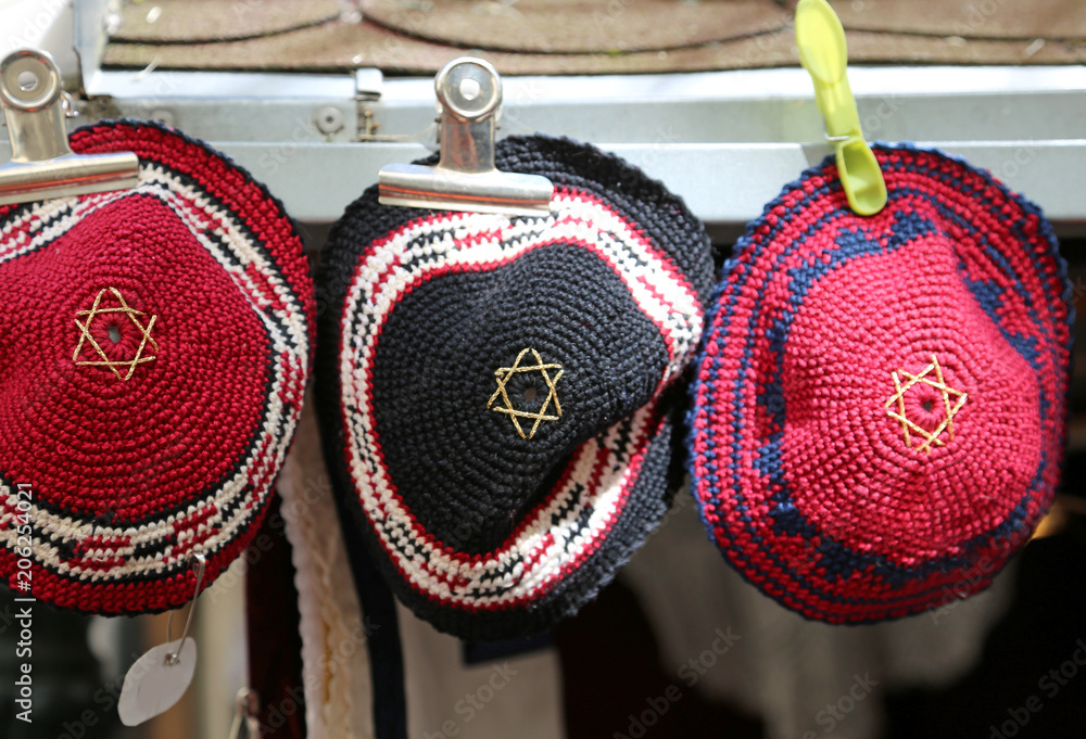Three Jewish religious headgear called kippahs or yarmulkes Stock Photo ...
