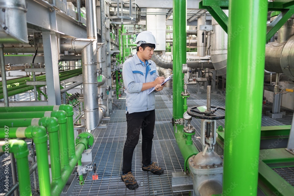 Engineer working and check valve at thermal power plant factory Stock ...