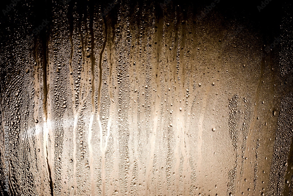 Drops of rain run down my window in the night Stock Photo | Adobe Stock