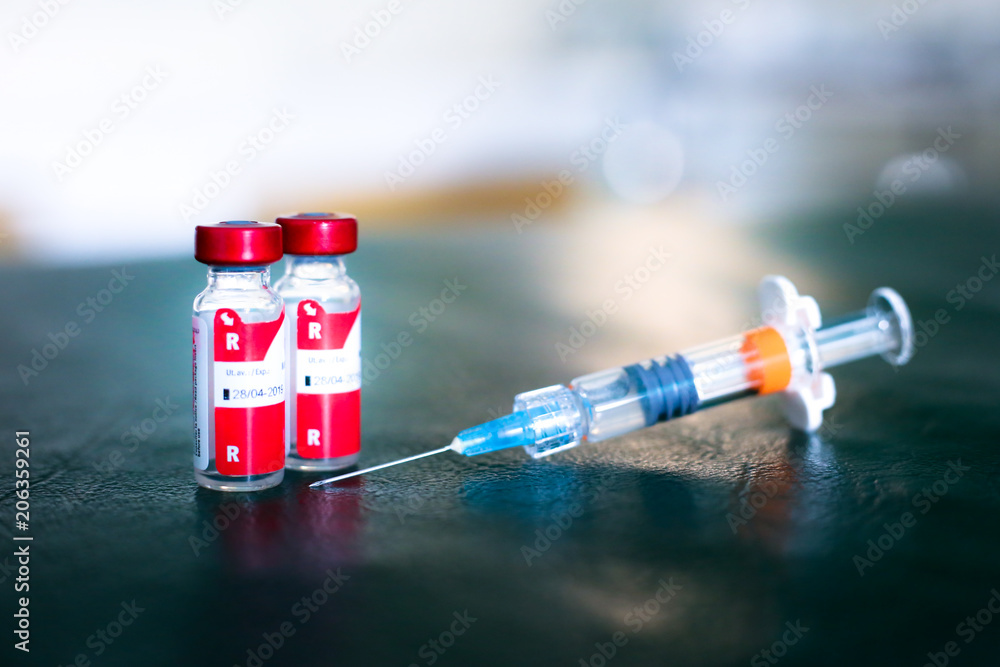 Vaccine vial dose flu shot drug needle syringe,medical concept ...