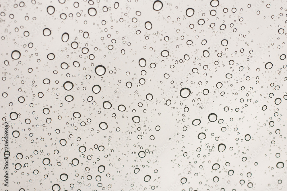 Drops of rain on the tinted windshield of the car. texture Stock Photo ...