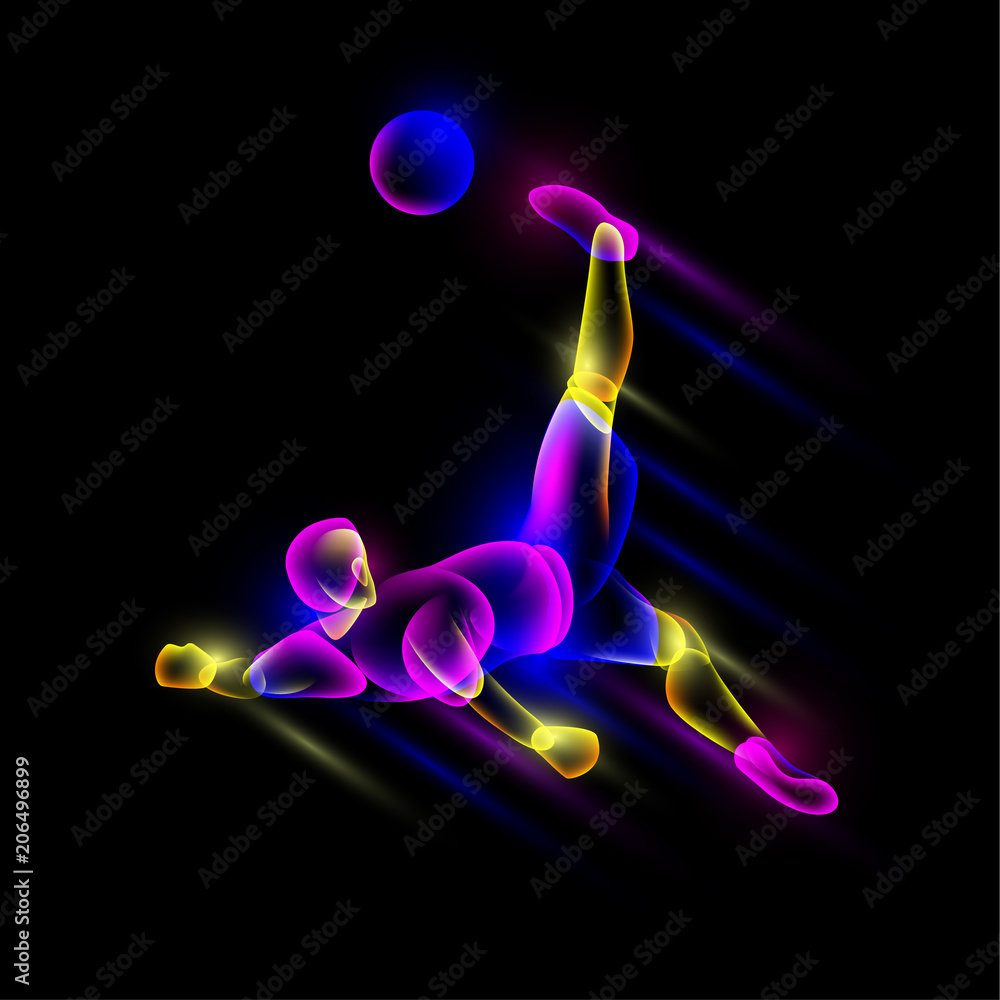 Soccer player hits the soccer ball in falling through himself. Abstract ...