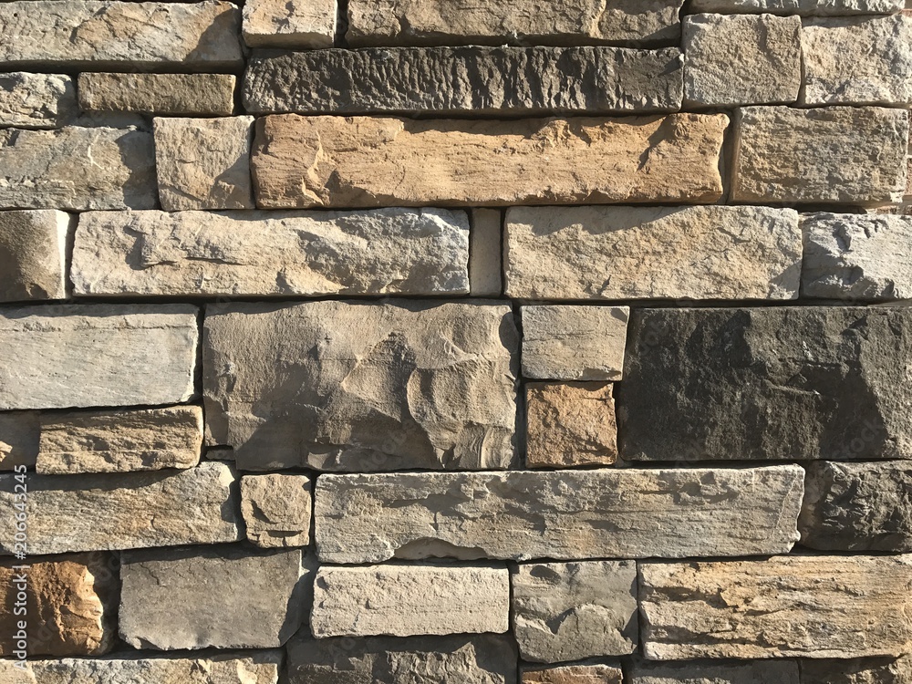 Stacked stone wall background. Photo image Stock Photo | Adobe Stock