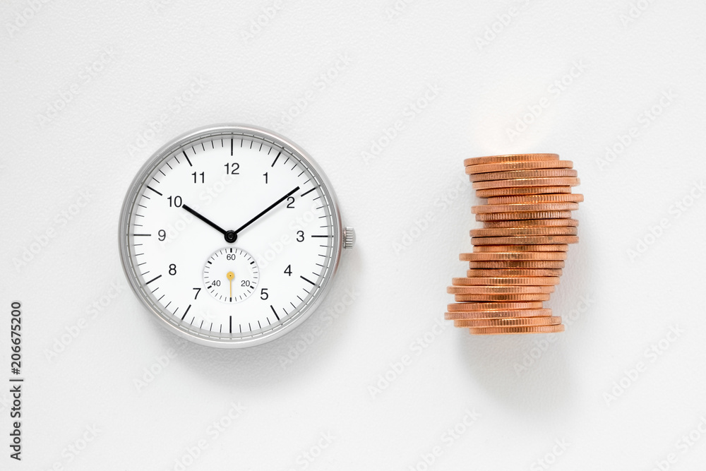 clock and stacks of coins time and money in concept work life balance ...