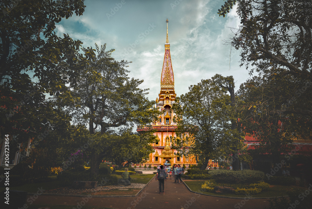 Golden ancient wat chalong temple complex with beautiful garden in ...