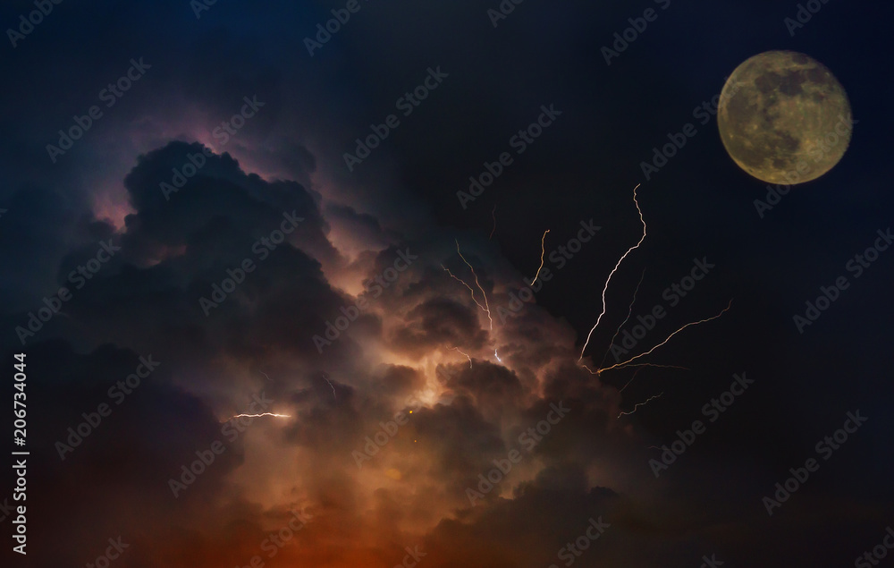 Dramatic Moon orbit planet Earth. lightnings in sunset sky with dark ...