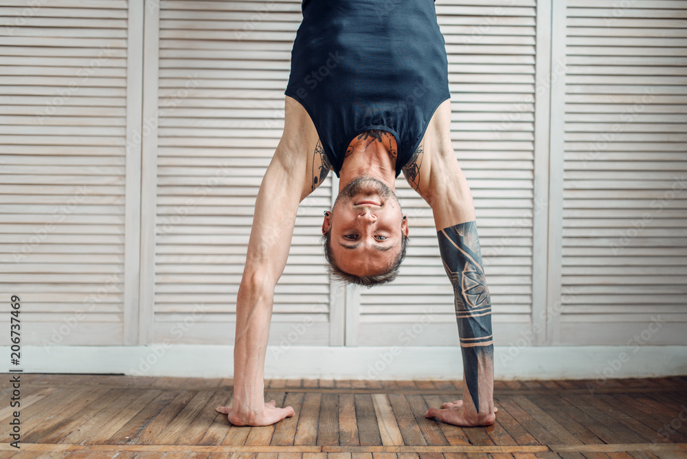 Yoga standing on hands, upside down exercise Stock Photo | Adobe Stock