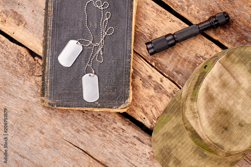 War army soldier things, flat lay. Top view. Wooden background. Stock ...