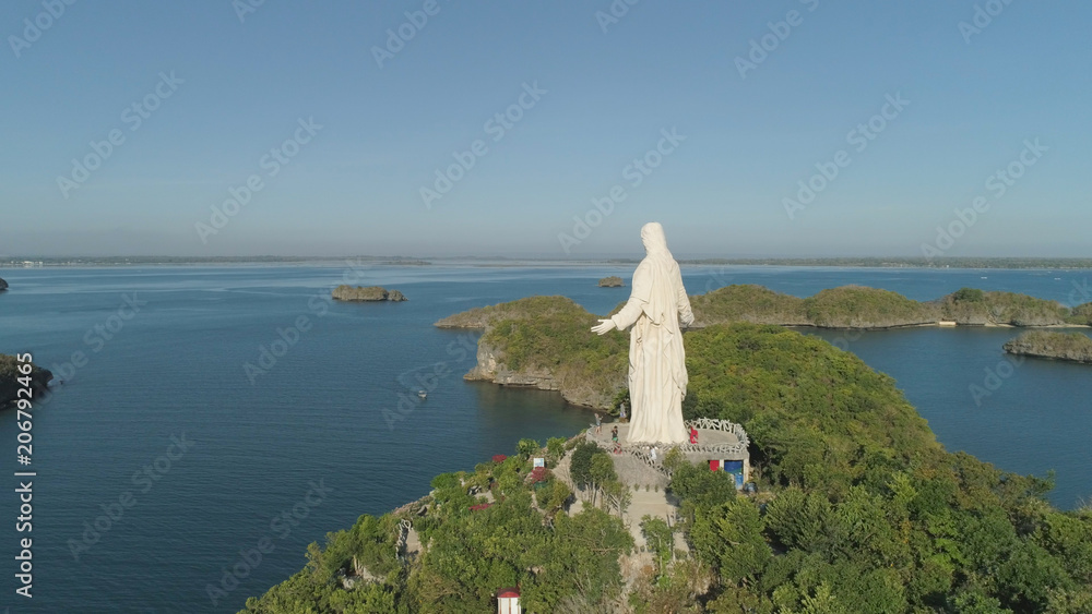 Statue of Jesus Christ on Pilgrimage island in Hundred Islands National ...