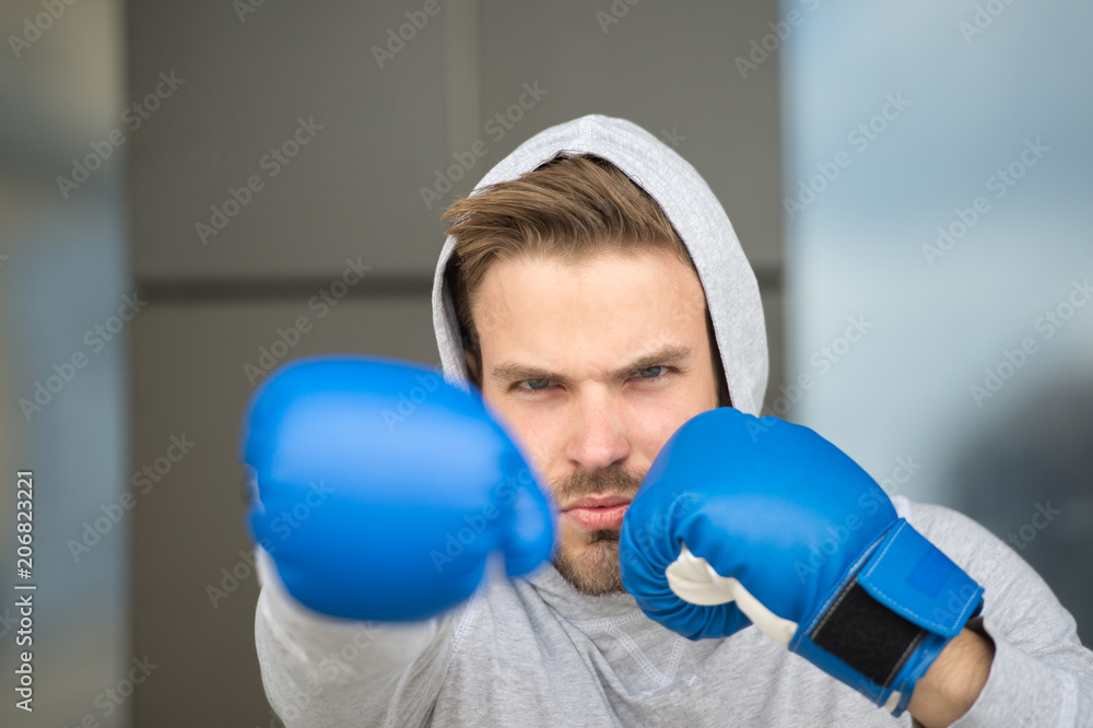Boxing concept. Man athlete on concentrated face with sport gloves ...