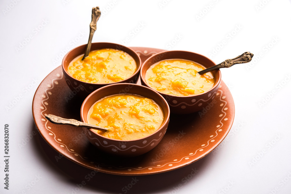Mango Pulp / Aam rus or Ras served in small bowls, selective focus ...