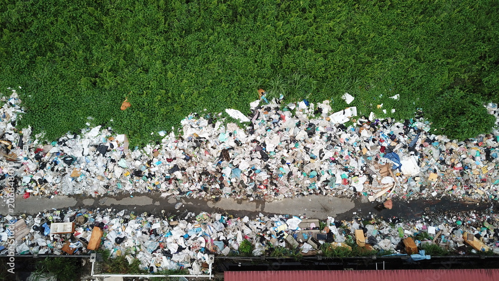 Pollution and poverty. Garbage trash pollutes poor shanty town in ...