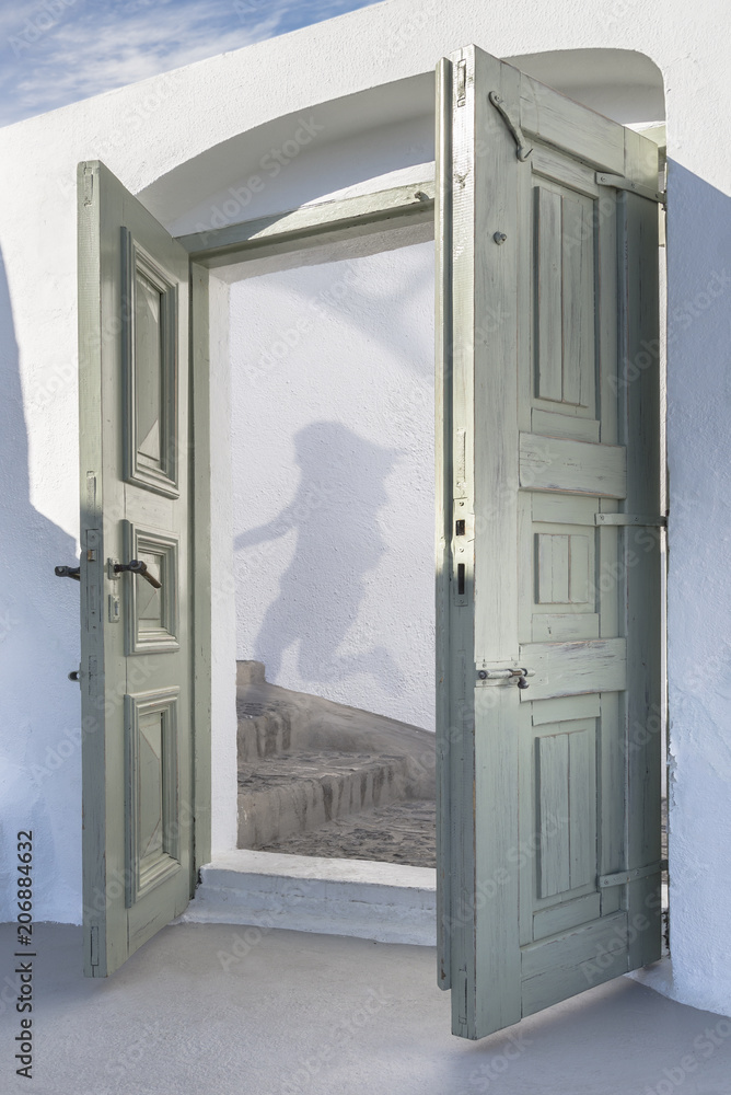 Shadow of playful girl seen through an open door Stock Photo | Adobe Stock