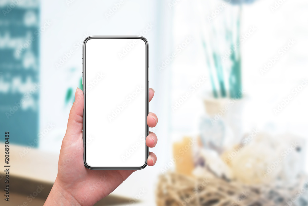 Modern mobile phone with thin round edges in woman hand. Isolated ...