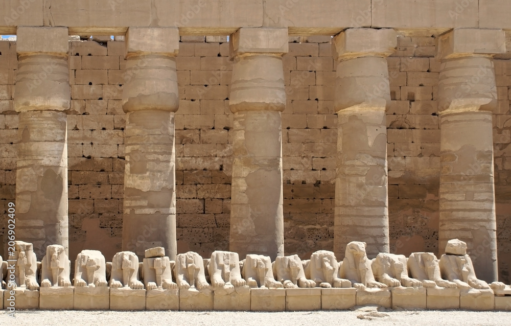 Columns and sphinxes at the entrance to the main temple of Amon-Ra in ...