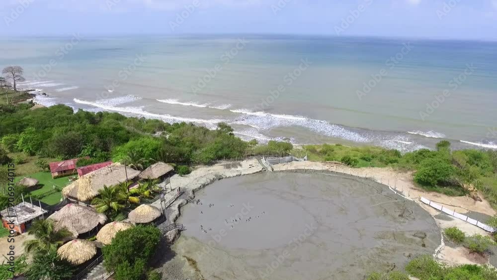 People bathing in the Arbolete mud volcano drone aerial. Hot mud pool ...