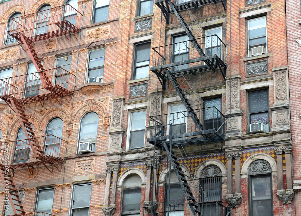 Fire escape and stairs on exterior of walk up apartment building Stock ...