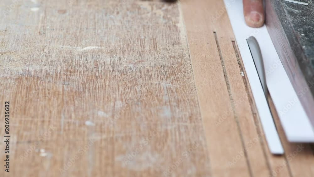 Carpenter at work. Old Chinese carpenter and wood worker cutting ...