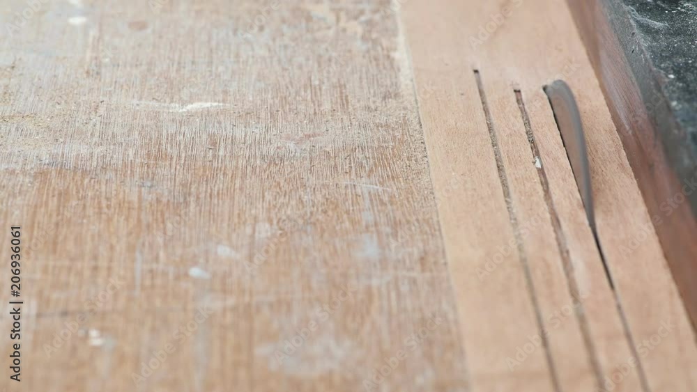 Carpenter at work. Old Chinese carpenter and wood worker cutting ...