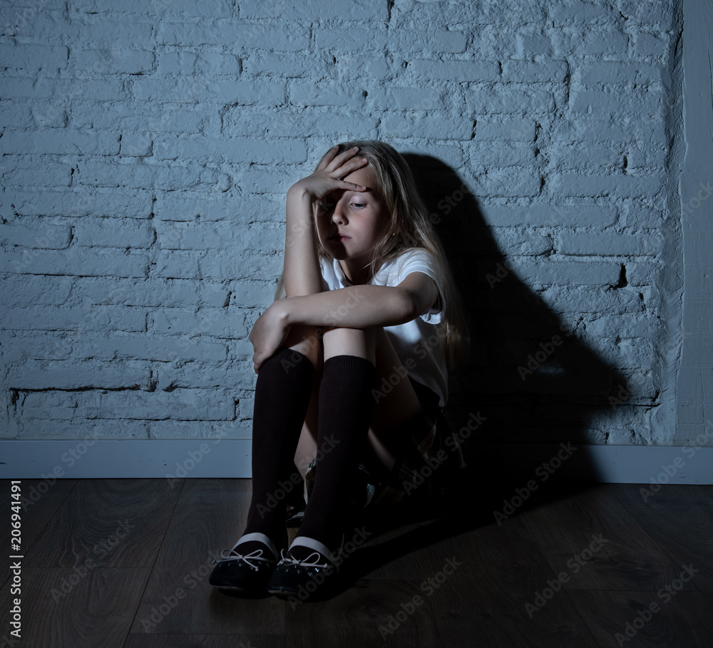 Depressed child victim of bullying feeling sad, unhappy, lonely, scared ...