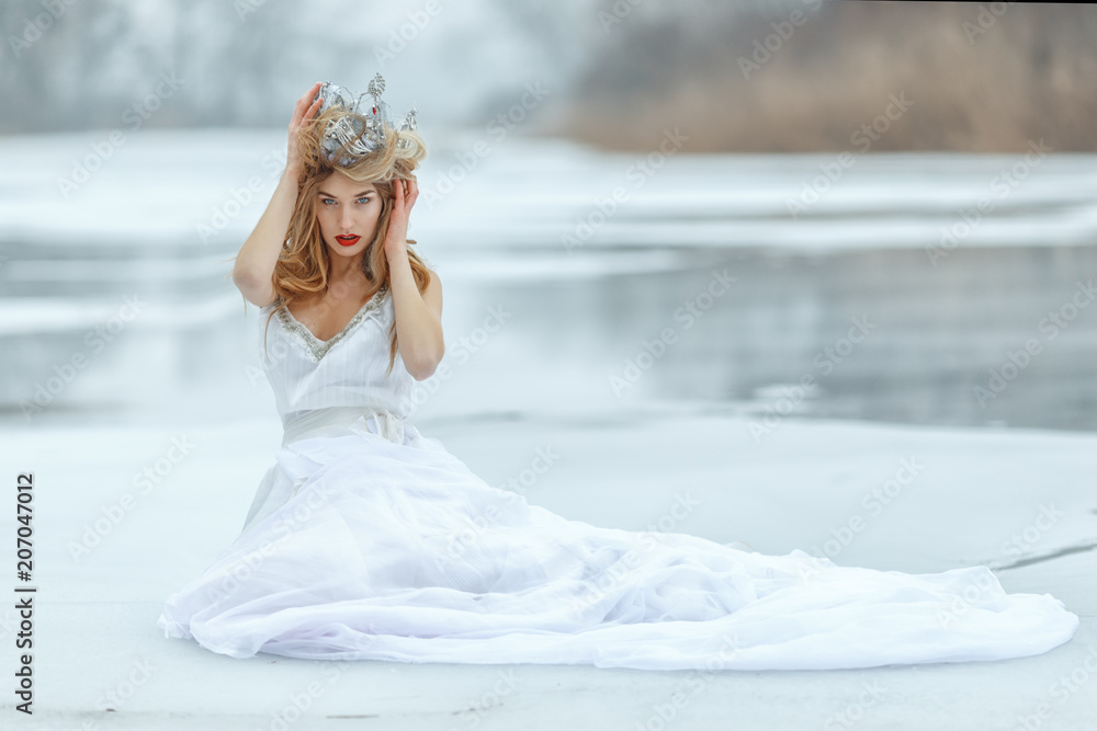 The Snow Queen. Young beautiful girl, blonde, in the image of a snow ...