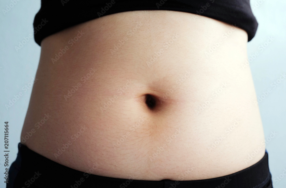 Fat body belly paunch , diabetic risk factor. Stock Photo | Adobe Stock