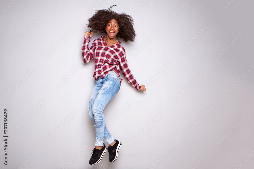 Black Woman Jumping For Joy