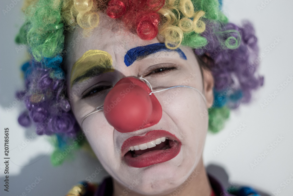 Sad crying girl clown Stock Photo | Adobe Stock