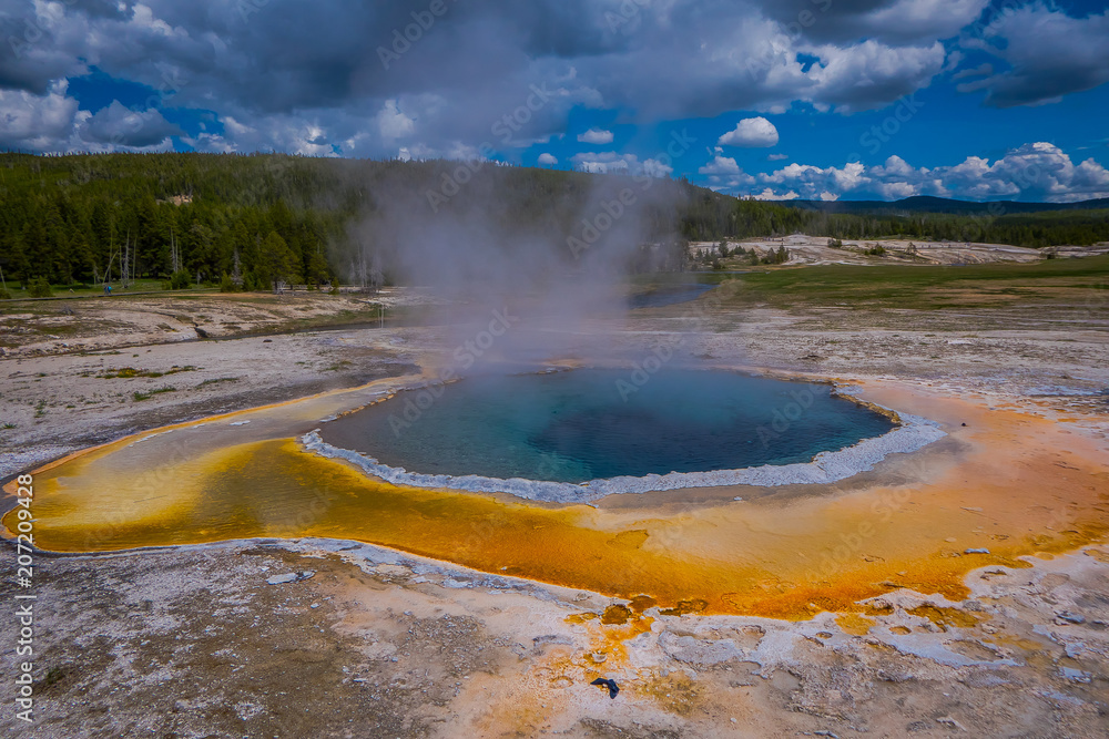 Crested pool hot spring and orange microbial mat in the old faithful ...