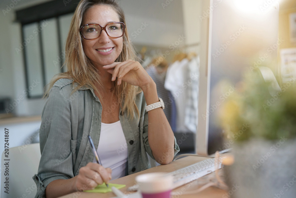 Beautiful woman working on desktop computer, co-working area Stock ...