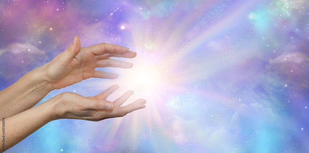 Cosmic Energy - female hands reaching into a bright white cosmic flash ...