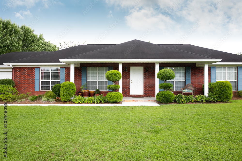 1980's Brick Ranch Style House in the Suburbs Stock Photo | Adobe Stock